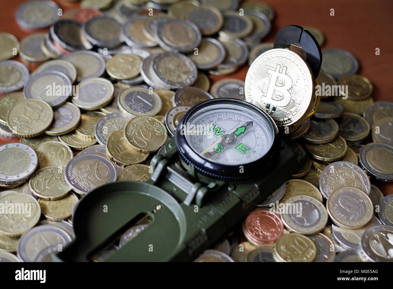 Money compass hi-res stock photography and images - Alamy