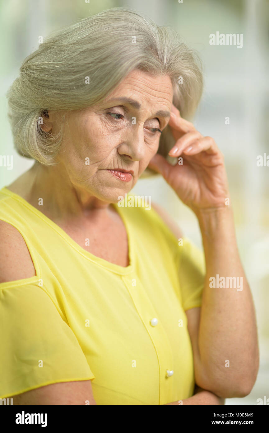 stressed senior woman Stock Photo - Alamy