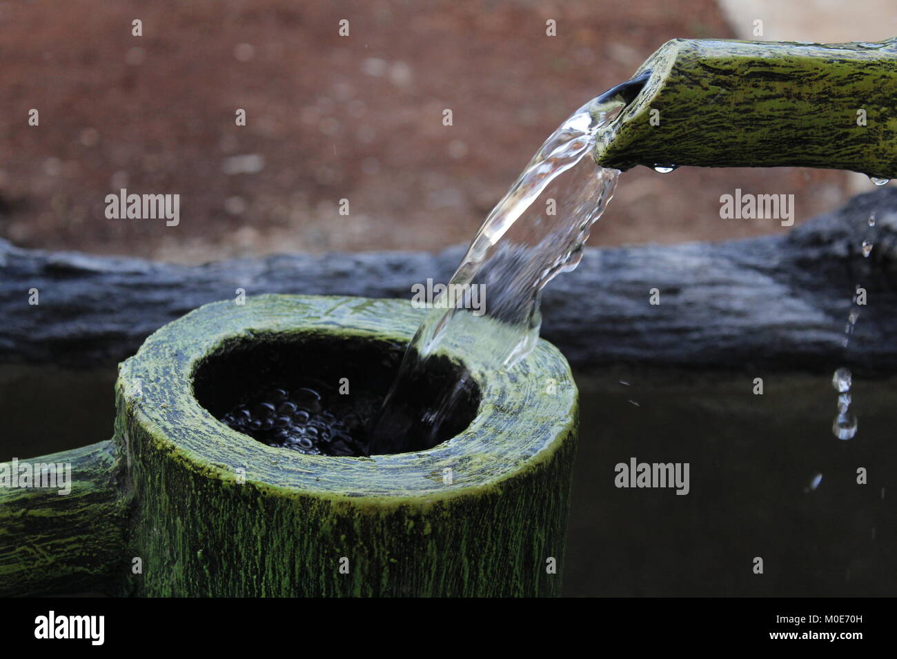 Bamboo water pipe hi-res stock photography and images - Alamy