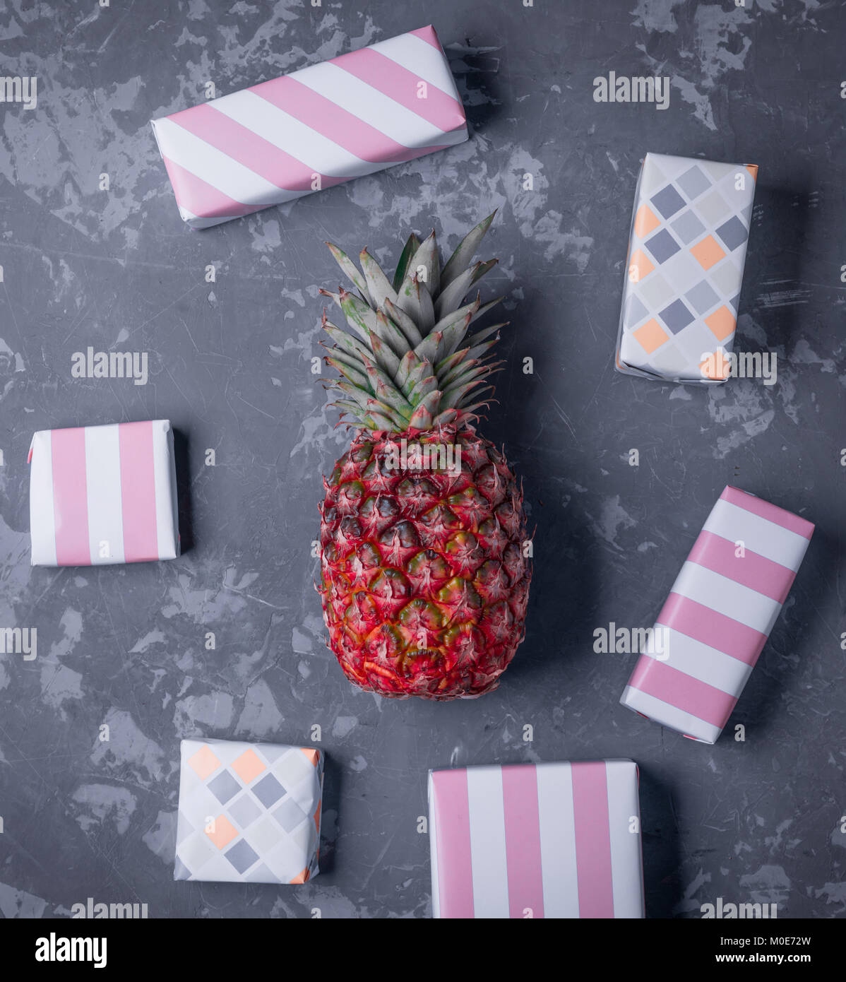 craft paper present boxes with red pineapple, color filters in soft ...
