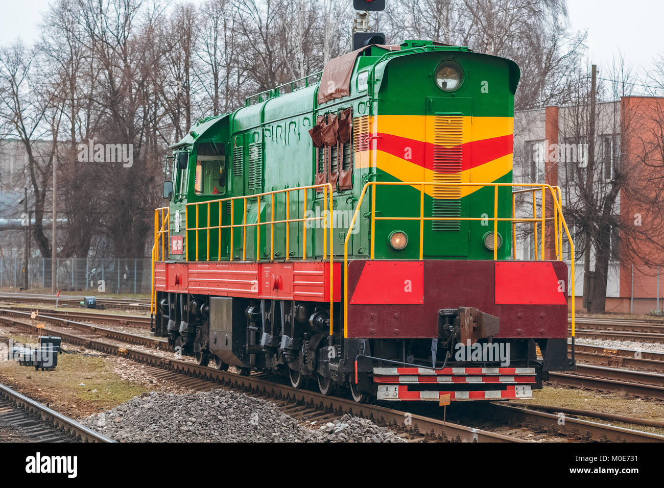Green diesel cargo locomotive. Freight train in action Stock Photo - Alamy
