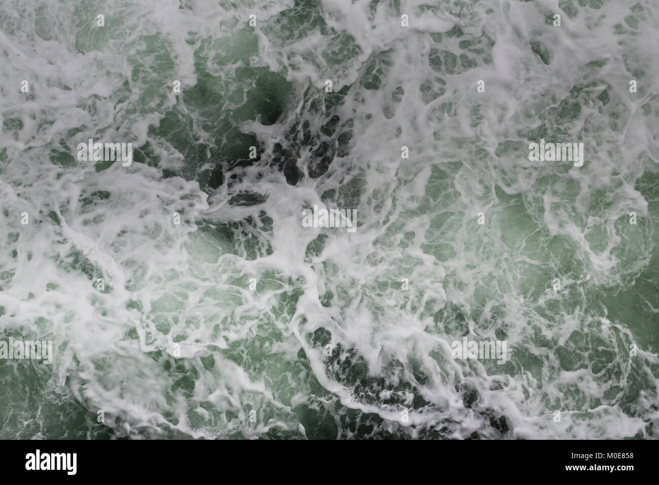 Big water splash seen from above a boat Stock Photo - Alamy