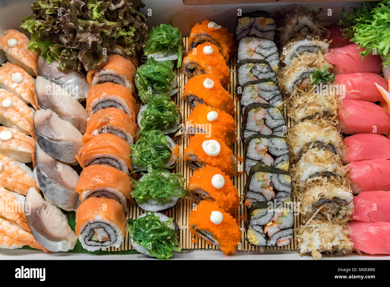 Sushi arrange in buffet line Stock Photo - Alamy