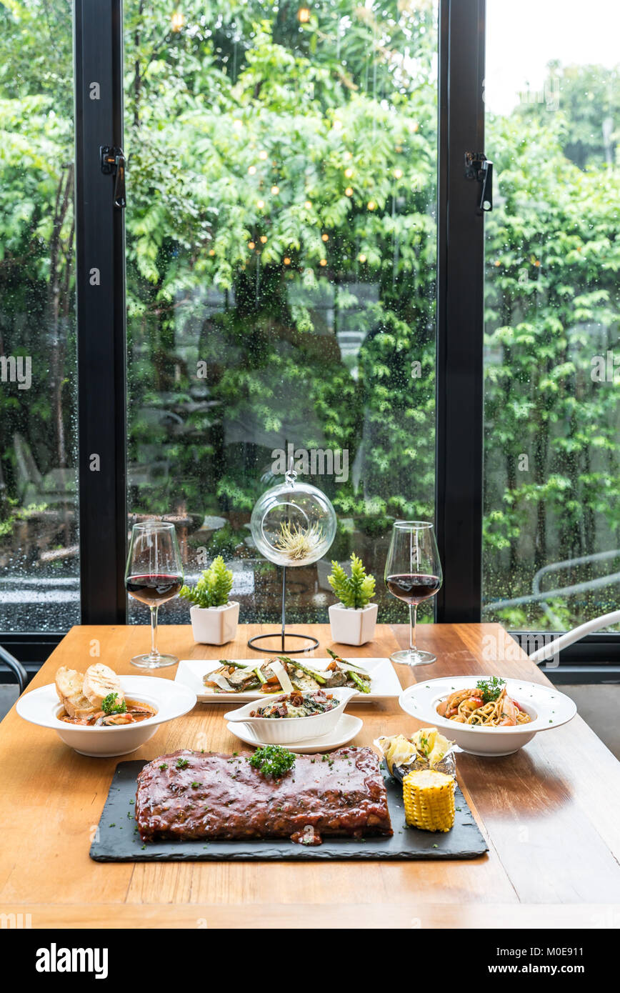 dining table with food ready to eat Stock Photo - Alamy