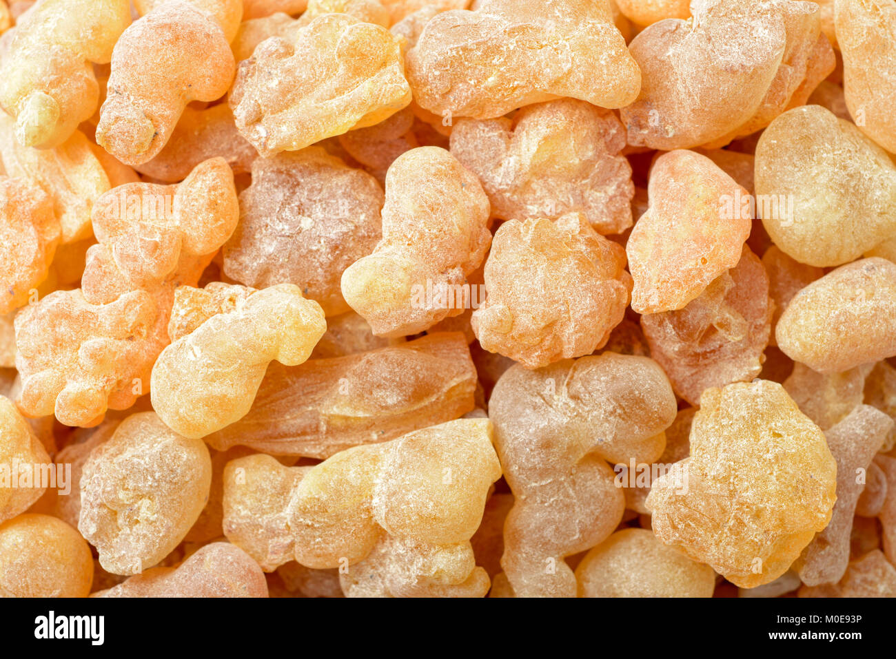 background of yellow pure frankincense resin, top view Stock Photo - Alamy