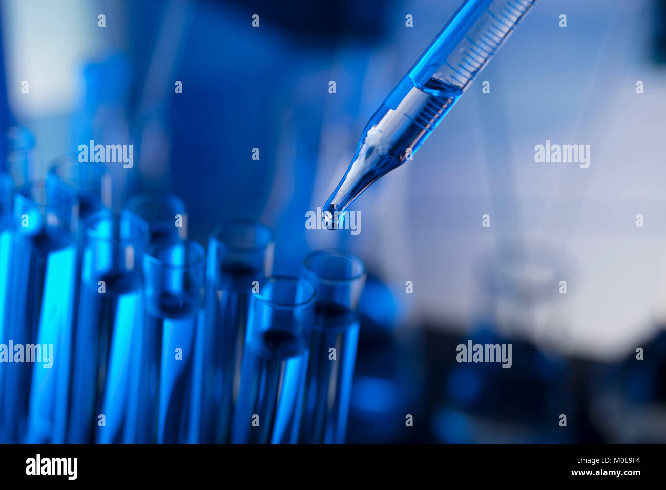 Science concept background. Microscope and laboratory glassware ...