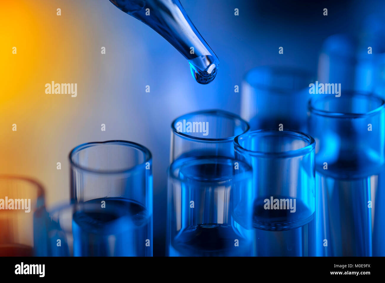 Science concept background. Microscope and laboratory glassware ...