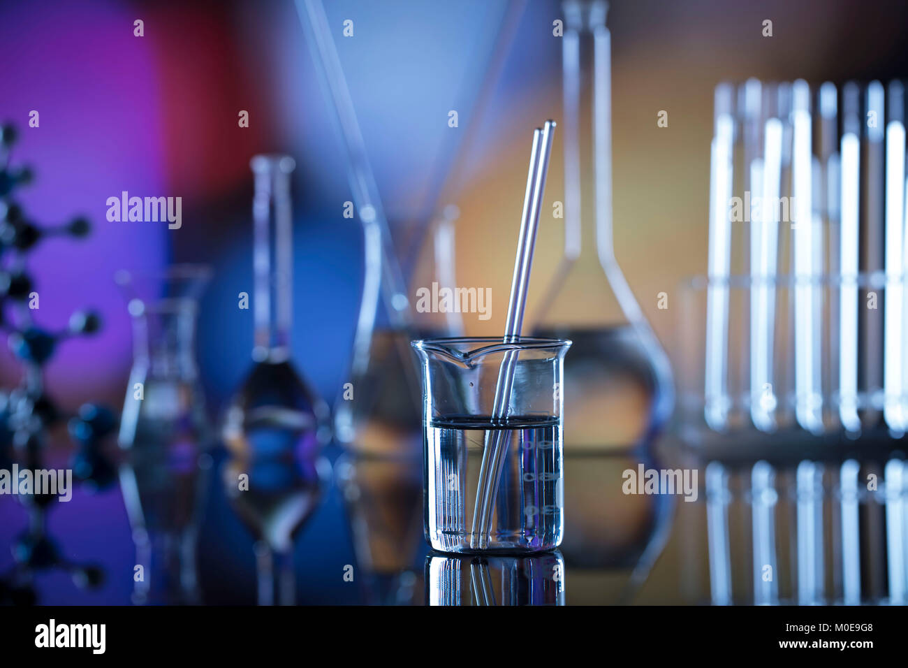 Science concept background. Microscope and laboratory glassware ...