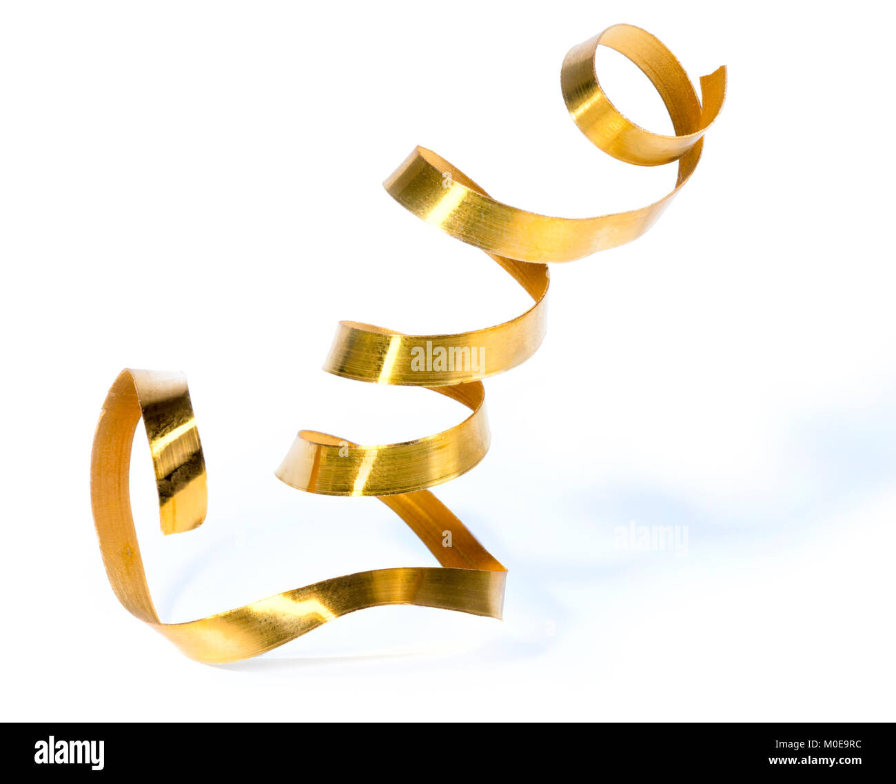 Chips of gold color - isolated Stock Photo - Alamy