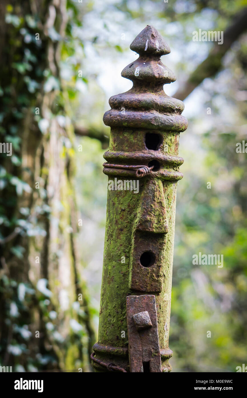 Old rusty metal gate post Stock Photo - Alamy