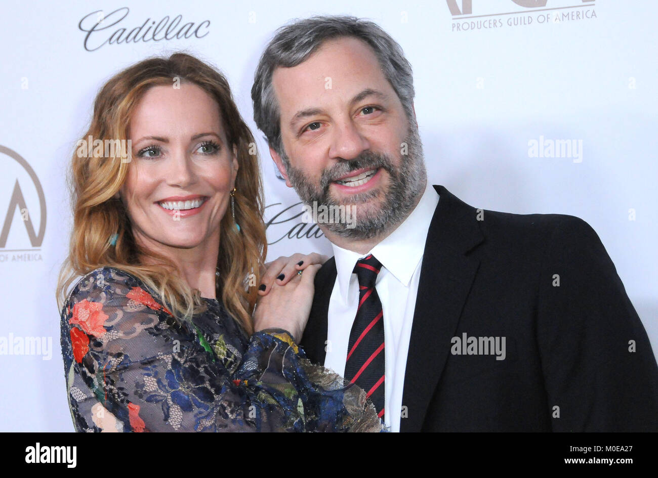 BEVERLY HILLS, CA - JANUARY 20: (L-R) Actress Leslie Mann and husband ...