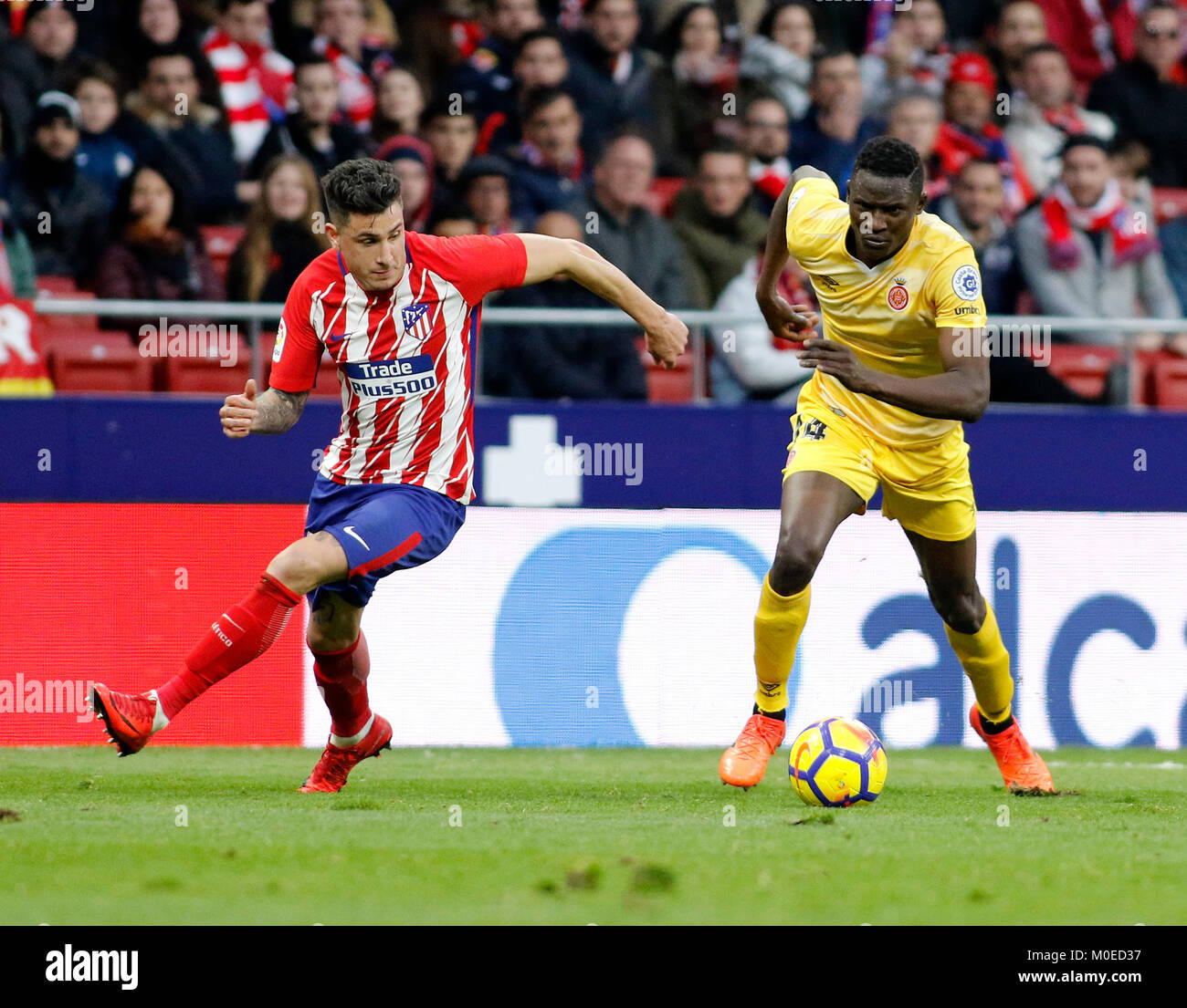 Gimenez and Ogada during La Liga match between Atletiico de Madrid and ...