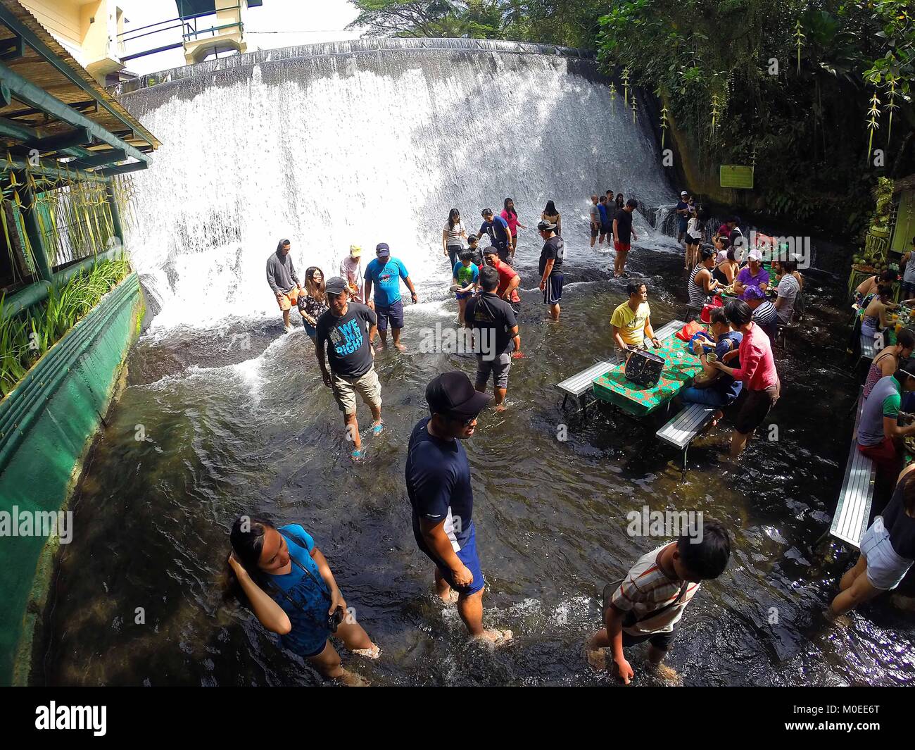 Quezon, Philippines. 21st Jan, 2018. Tourists enjoy the waters in a ...