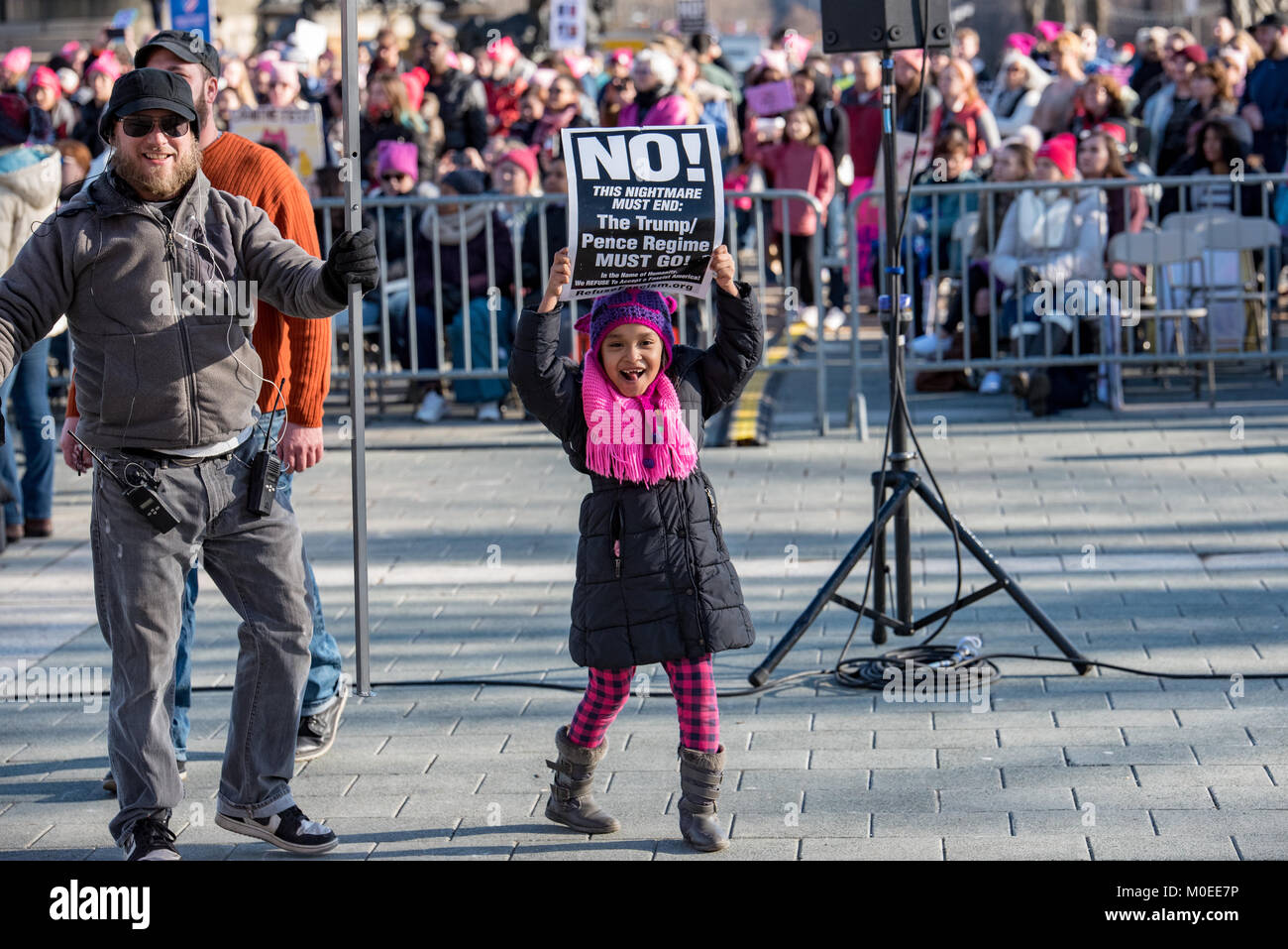 Philadelphia, Pennsylvania / USA: A young girl walks with an anti ...