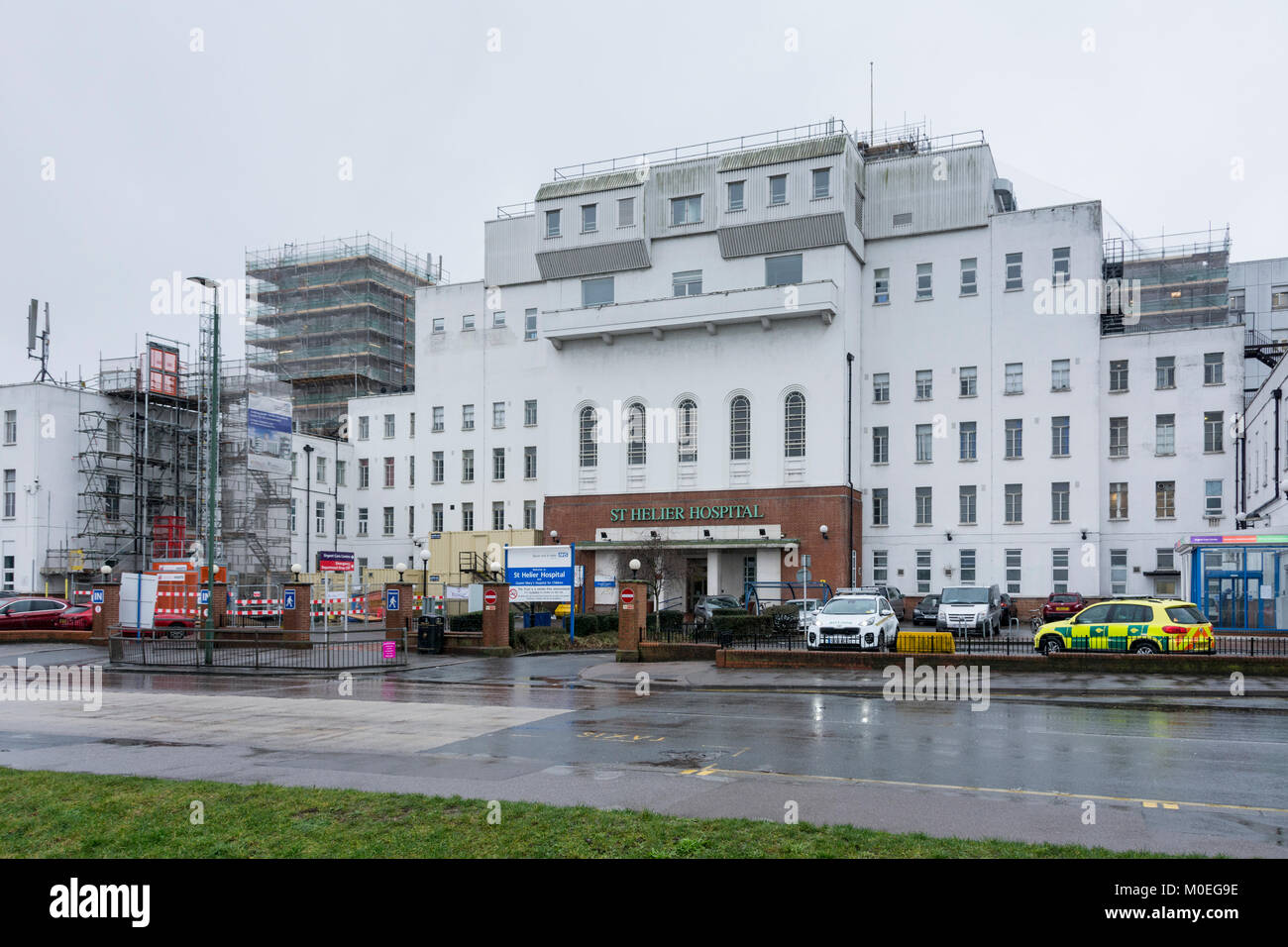 Scaffolding clad exterior facade of St Helier Hospital, Epsom and St ...