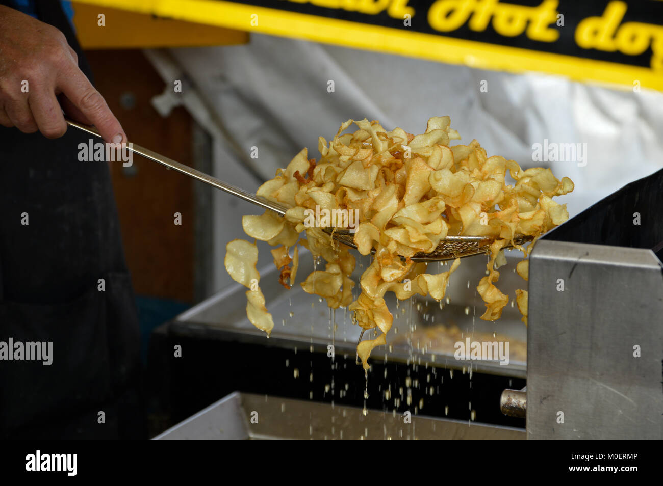 Potato chips dripping hi-res stock photography and images - Alamy