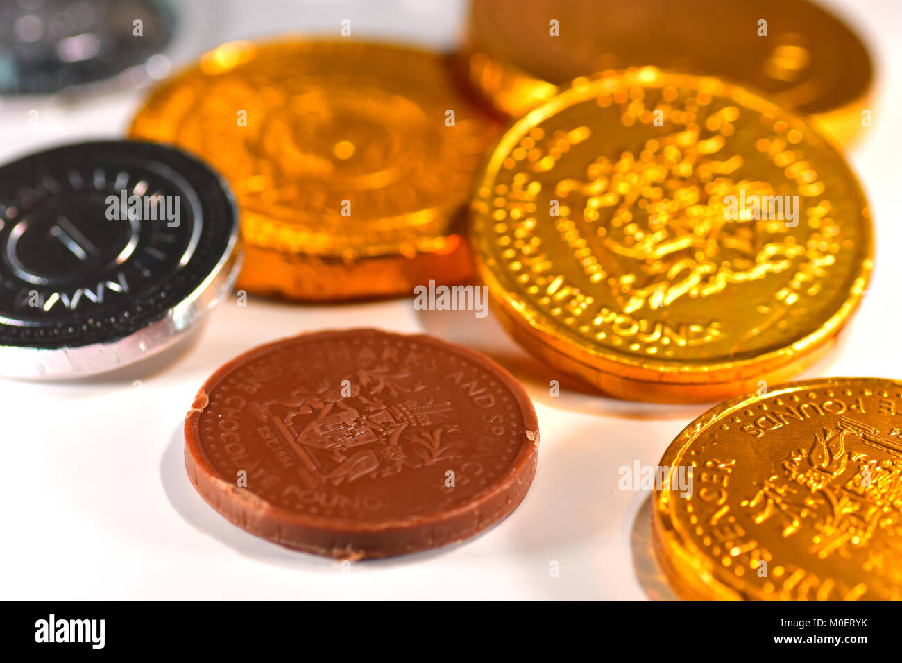 Weight pound coins hi-res stock photography and images - Alamy