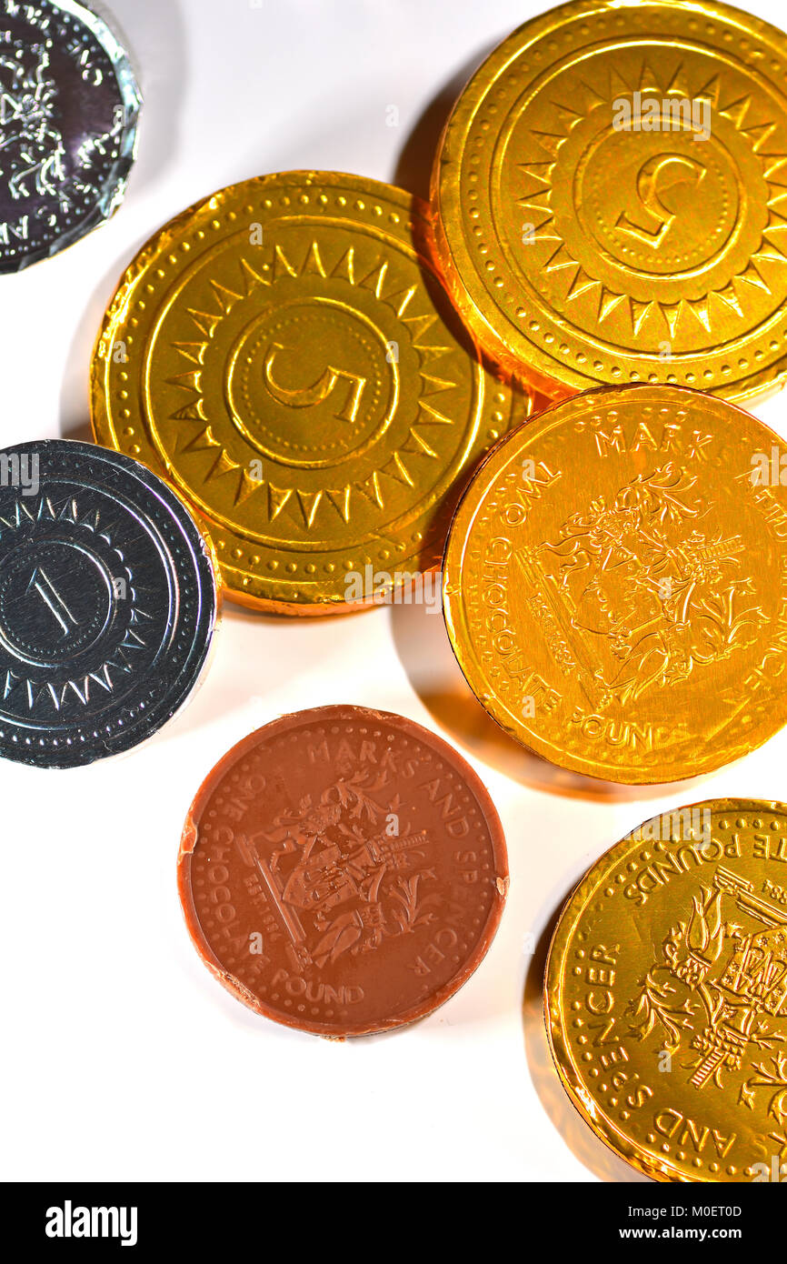 Weight pound coins hi-res stock photography and images - Alamy