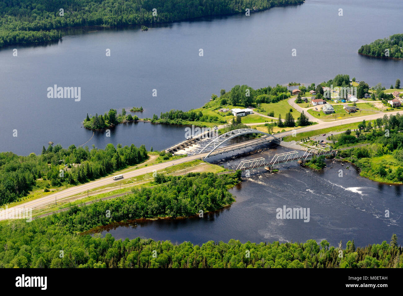 This is an aerial photograph of the Latchford Dam, between Bay Lake and ...