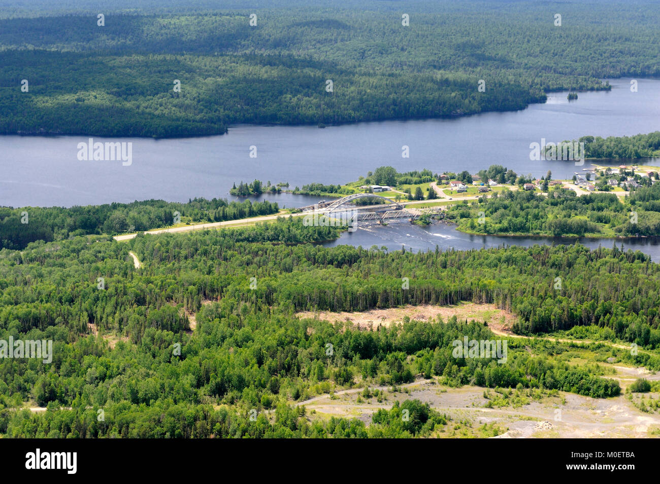 This is an aerial photograph of the Latchford Dam, between Bay Lake and ...