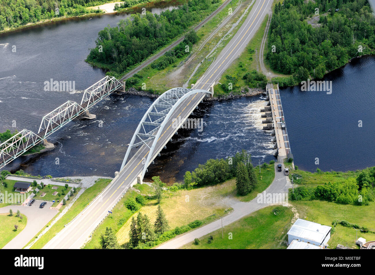 This is an aerial photograph of the Latchford Dam, between Bay Lake and ...