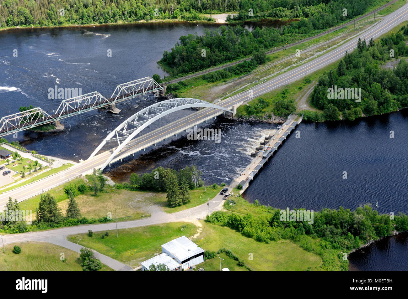 This is an aerial photograph of the Latchford Dam, between Bay Lake and ...