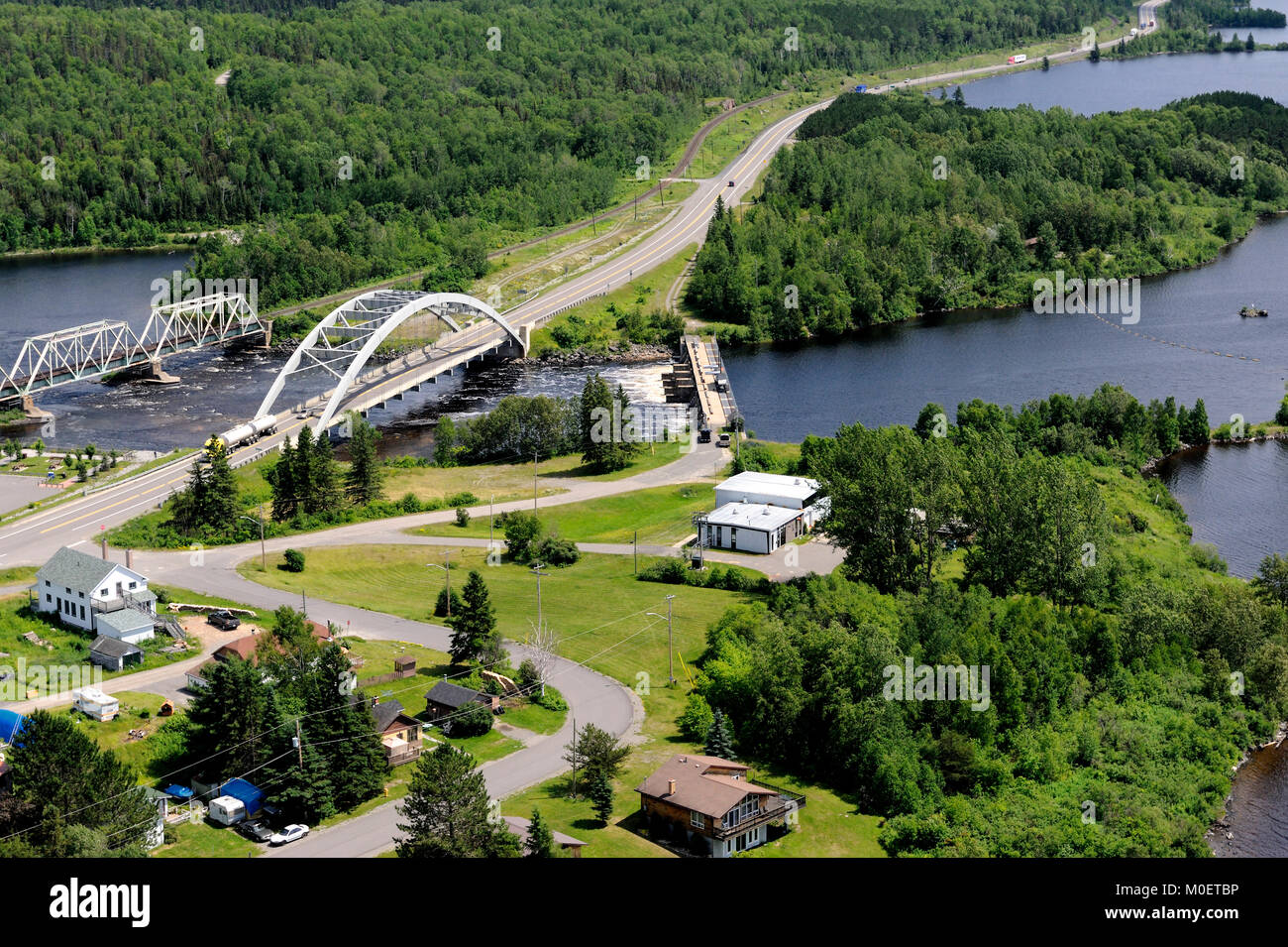 This is an aerial photograph of the Latchford Dam, between Bay Lake and ...