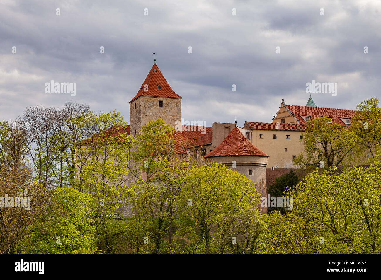 Red towers and wall of famous Hradcany castle. Prague, Czech Republic ...