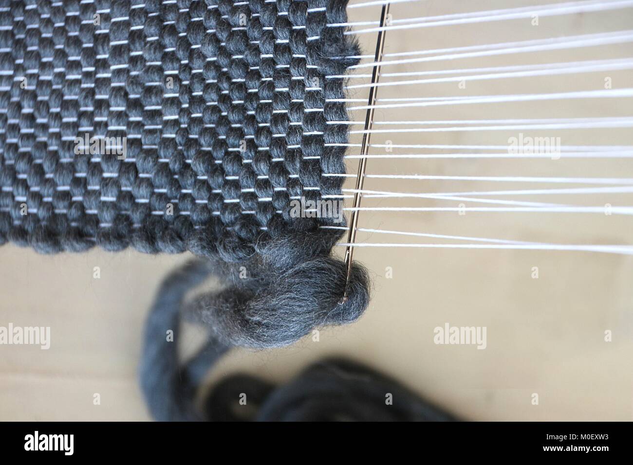 Close-up of wool weaving Stock Photo - Alamy