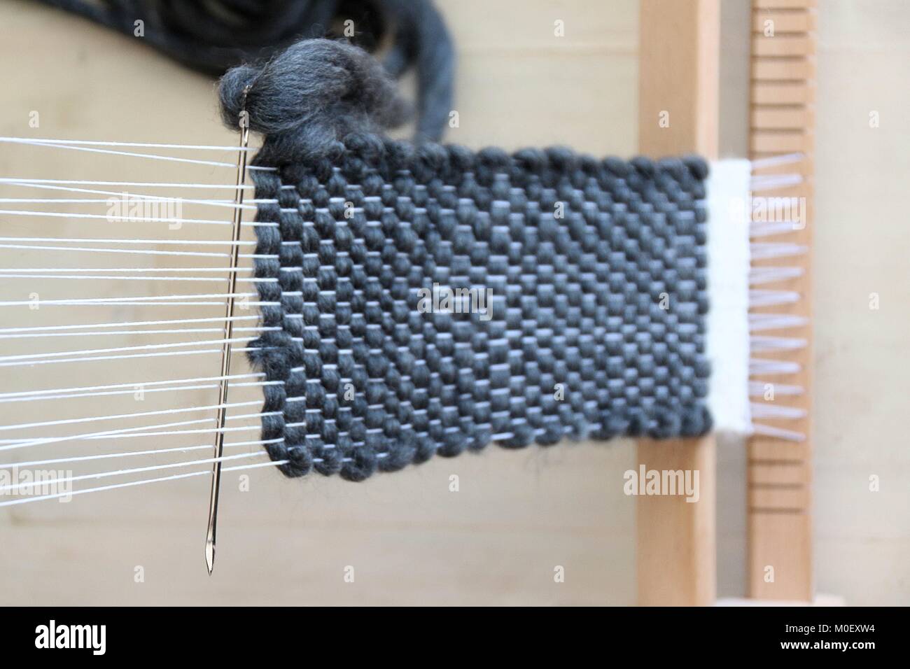 Close-up of wool weaving Stock Photo - Alamy