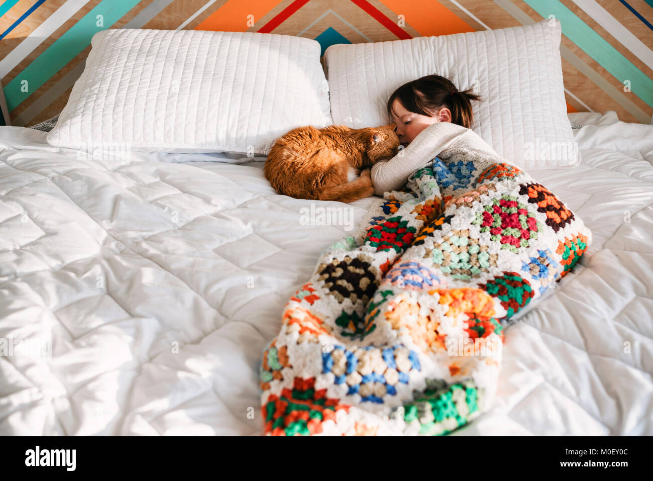 Girl napping on bed hi-res stock photography and images - Alamy
