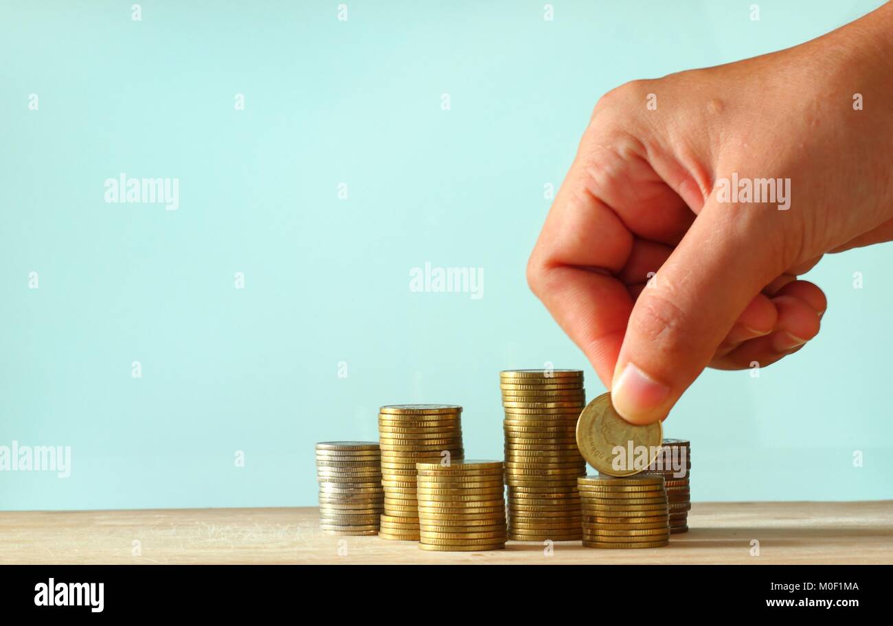 Save money with stack money coin for growing your business Stock Photo ...