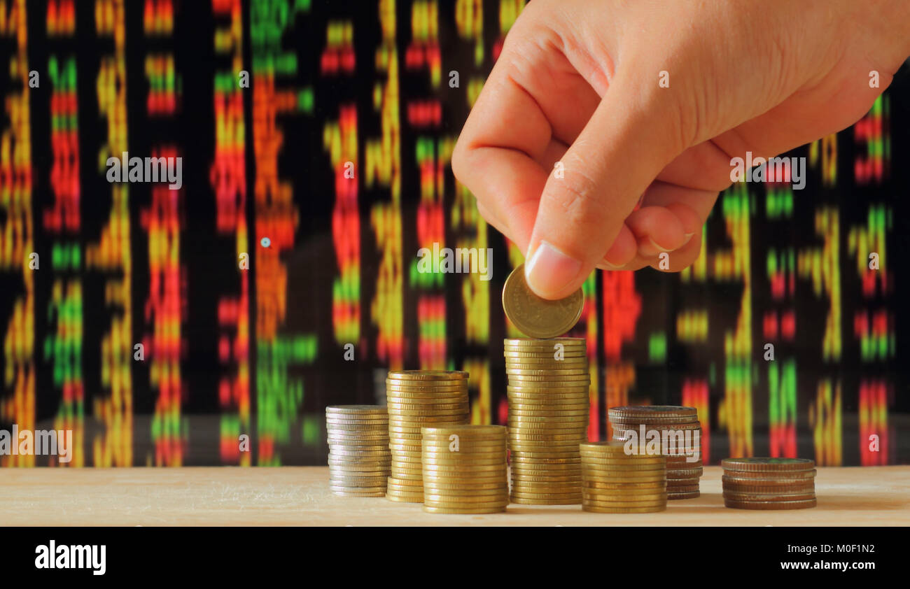 Save money with stack money coin for growing your business Stock Photo ...