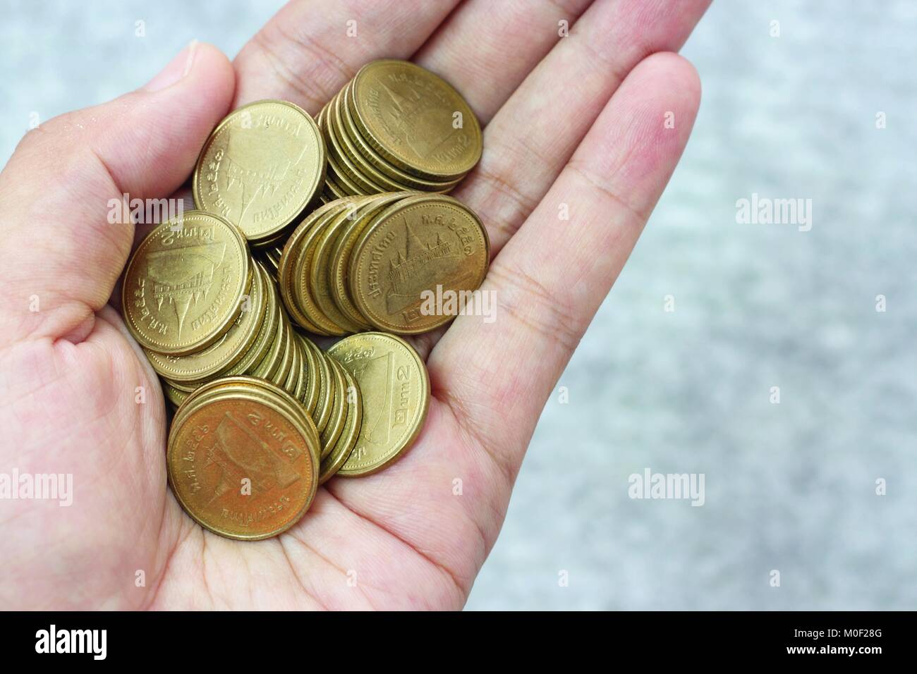 Money in hand Stock Photo - Alamy