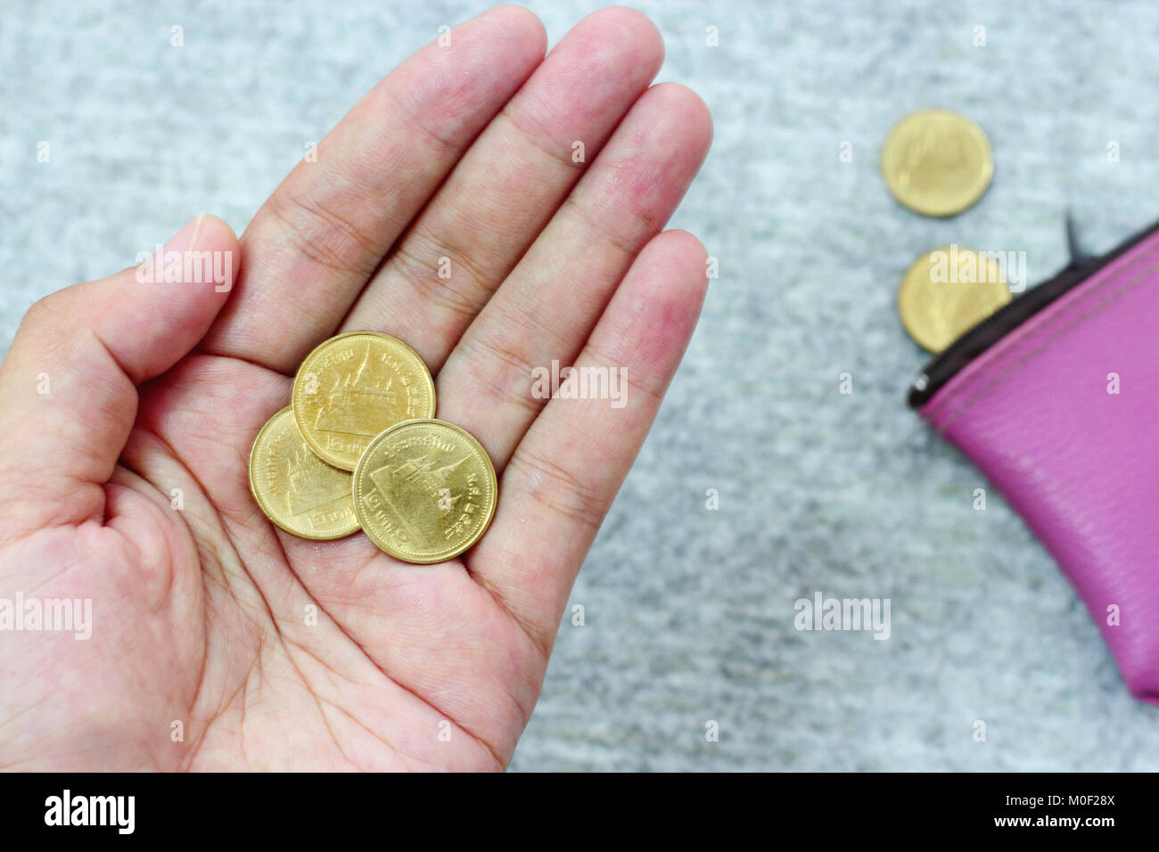 Money in hand Stock Photo - Alamy
