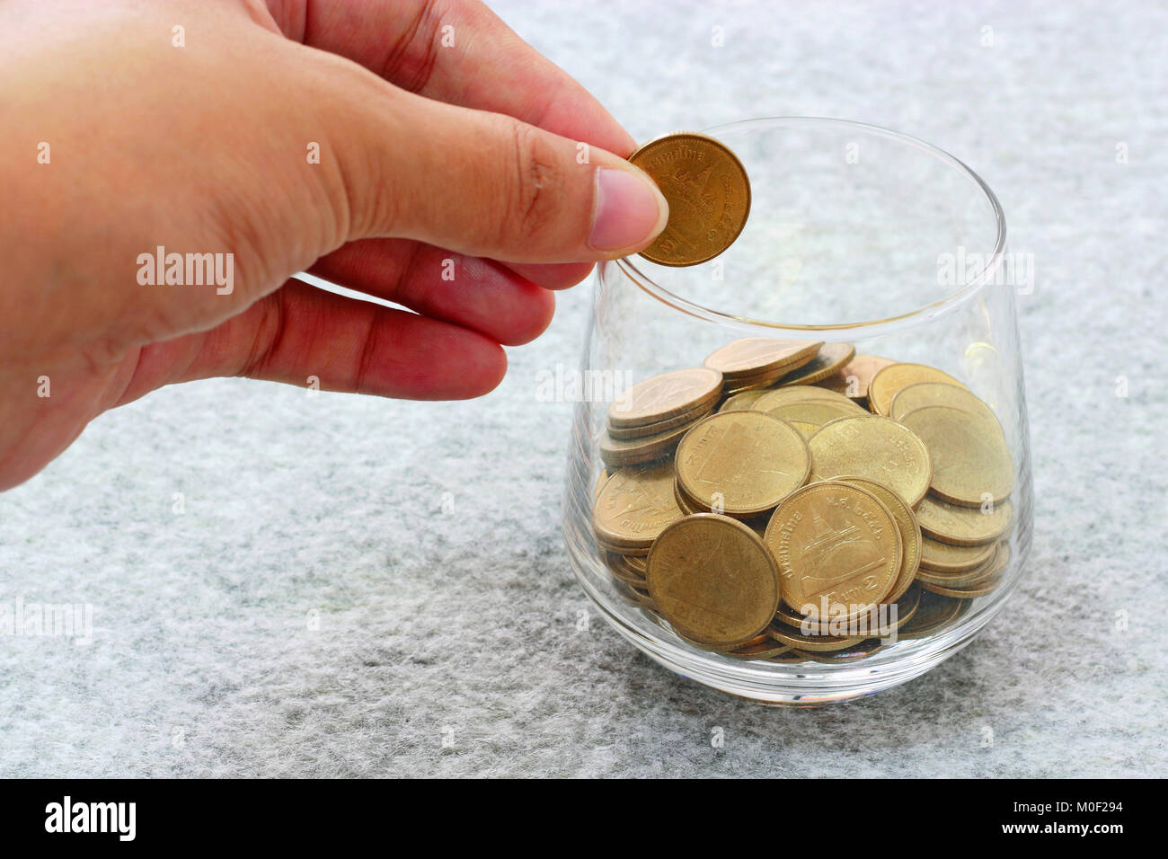Money in glass hi-res stock photography and images - Alamy