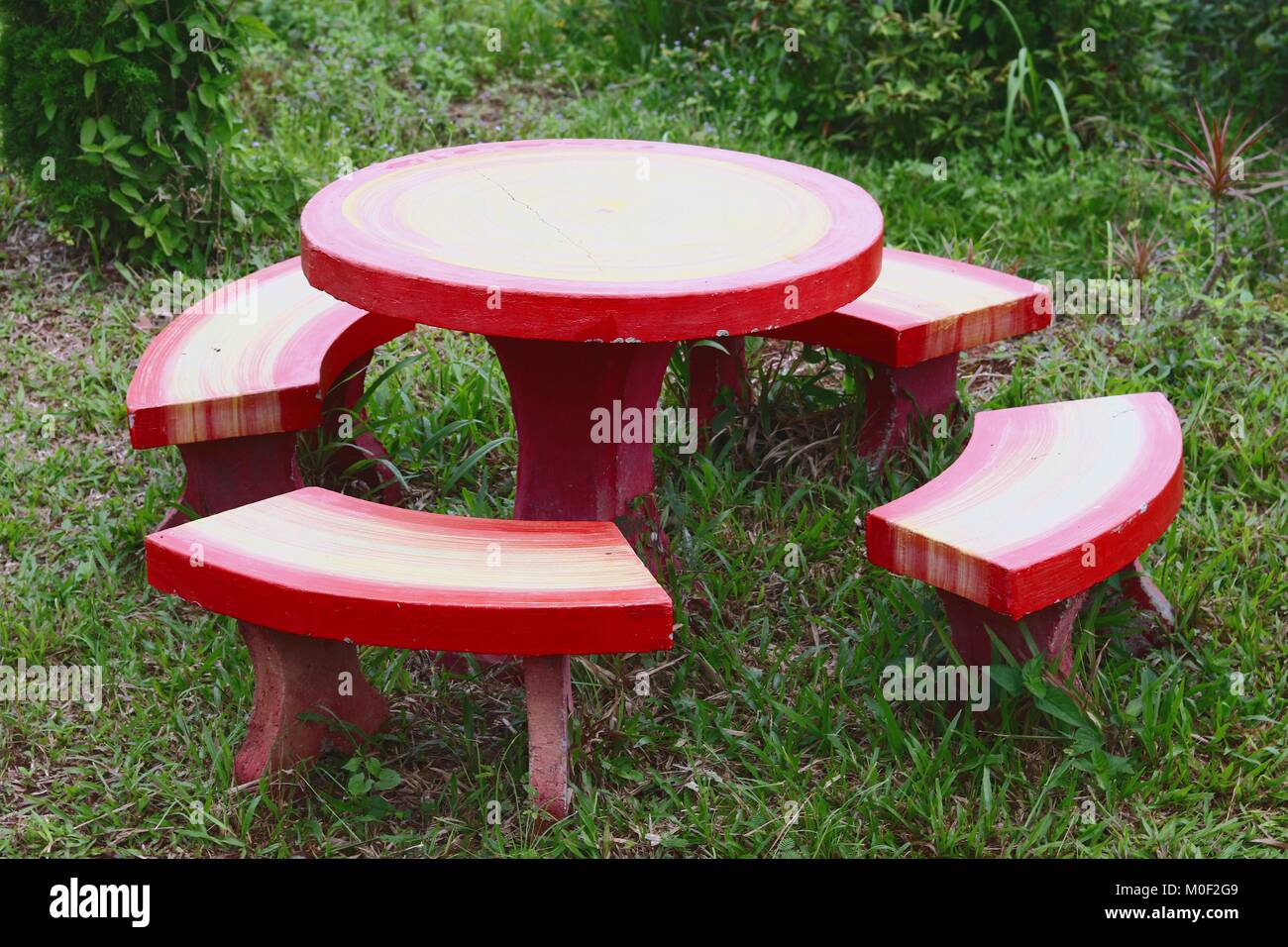 Set of table and chairs in garden Stock Photo - Alamy