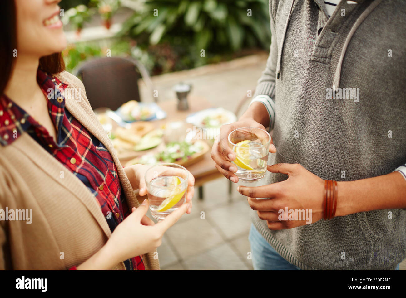 Friends with drinks Stock Photo - Alamy