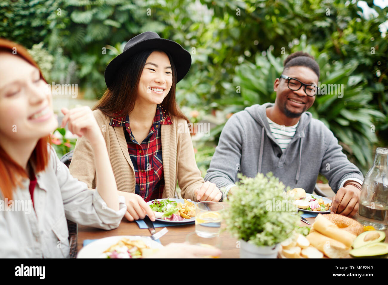 Laughing by dinner Stock Photo - Alamy