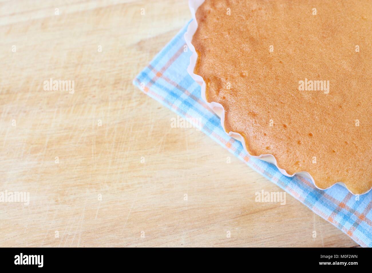 Butter cake on fabric texture Stock Photo - Alamy