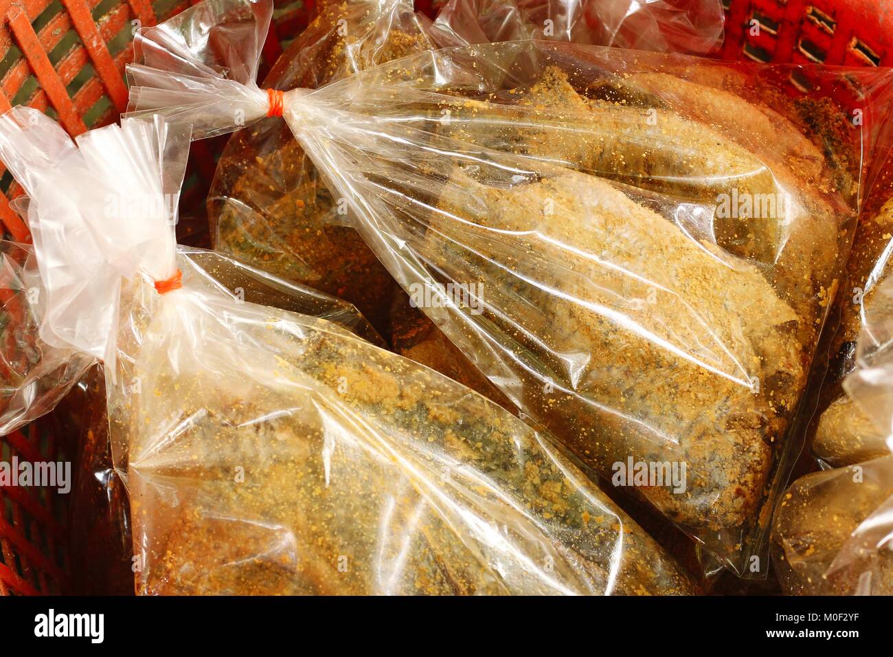 Local thai pickled fish or Pla-ra in the bag Stock Photo - Alamy