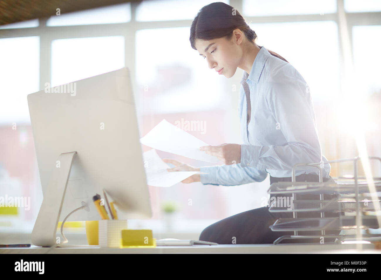 Person reading the economist hi-res stock photography and images - Alamy