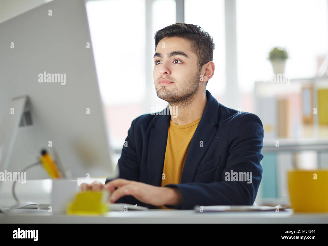 Man at work Stock Photo - Alamy