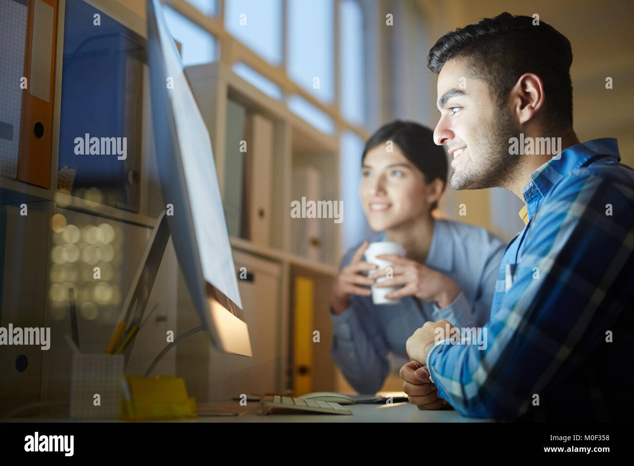 Evening in office Stock Photo - Alamy