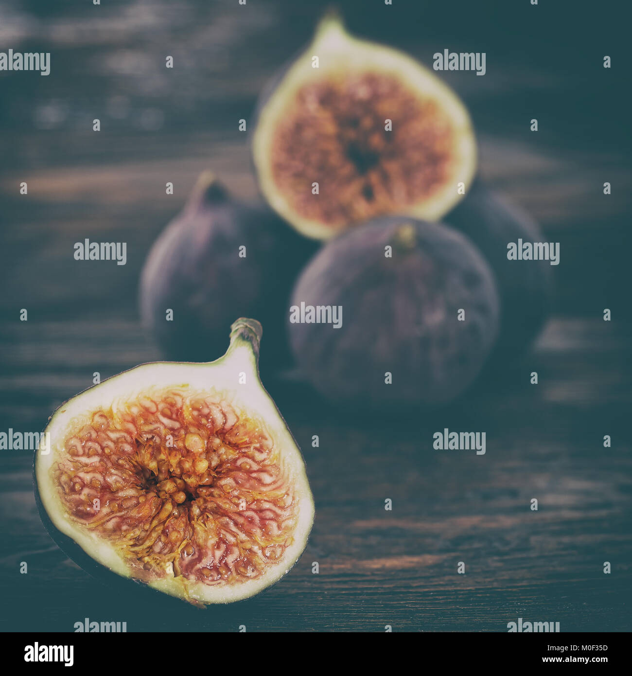 Ripe sweet figs . Healthy fig fruit on wooden table Stock Photo - Alamy