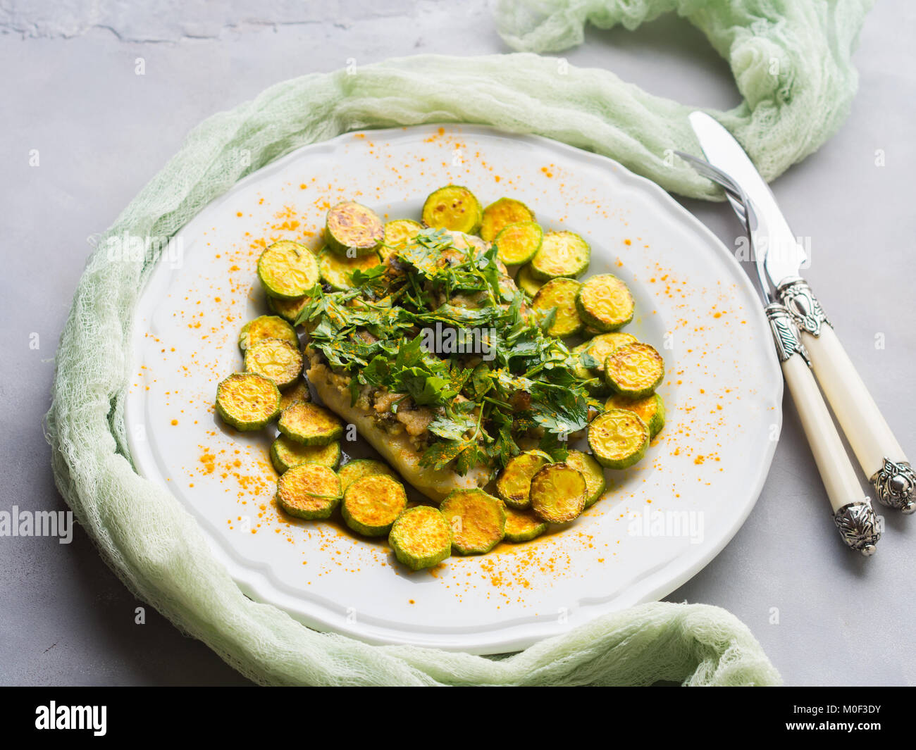 Baked Stock fish fillet with almond parsley topping and turmeric ...