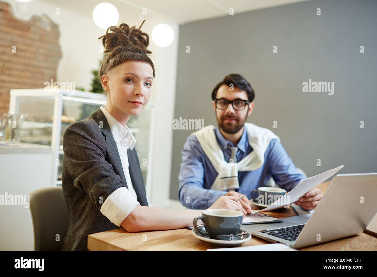 Group successful managers looking hi-res stock photography and images ...