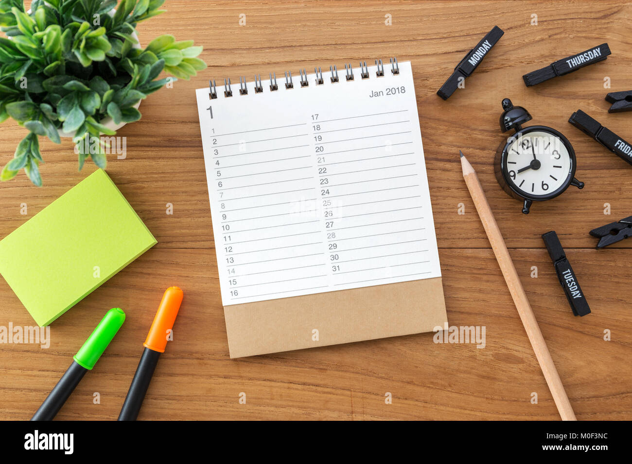 To do list on wooden table with pencil clock from top view Stock Photo ...