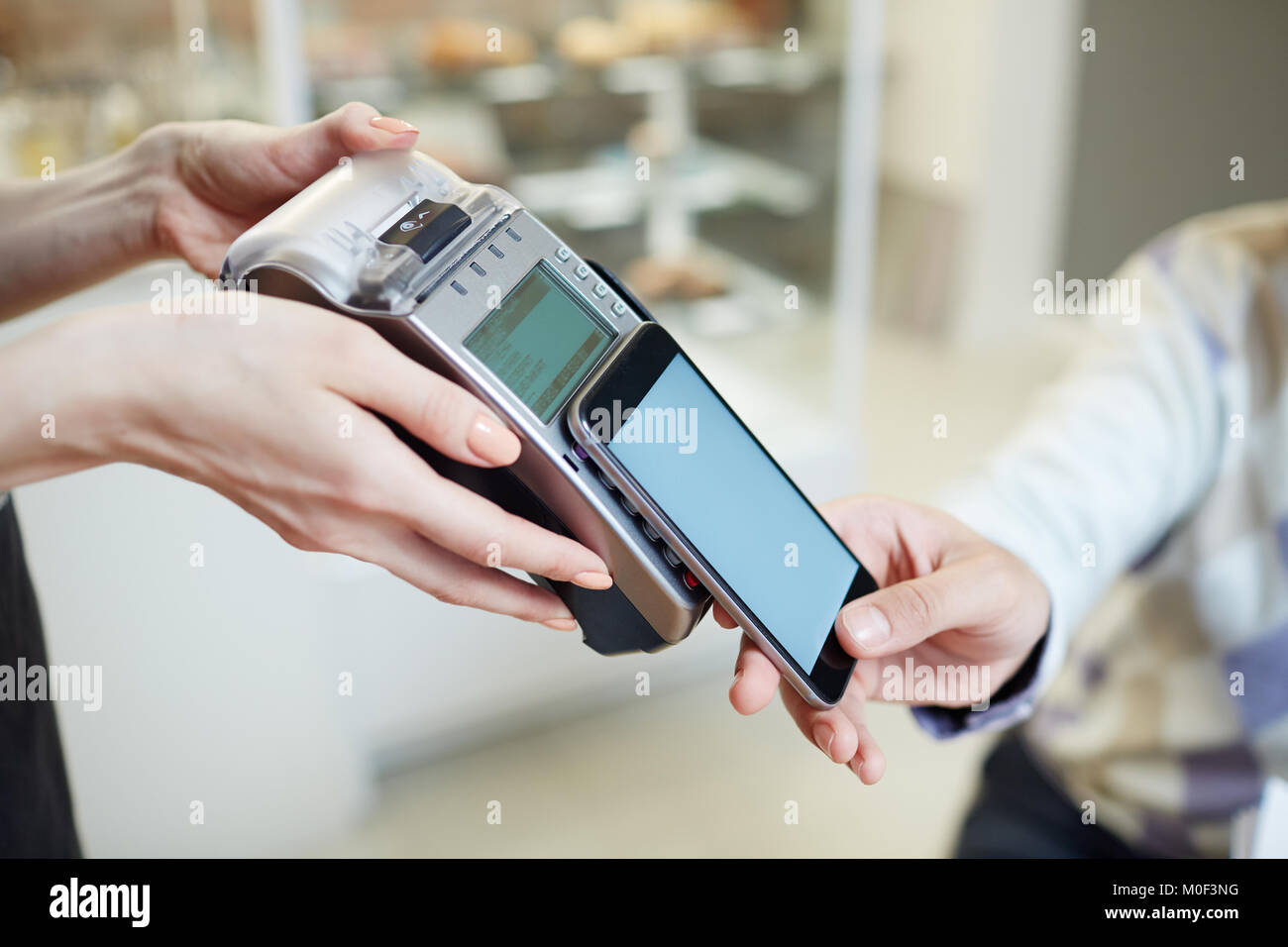 Client making contactless payment hi-res stock photography and images ...