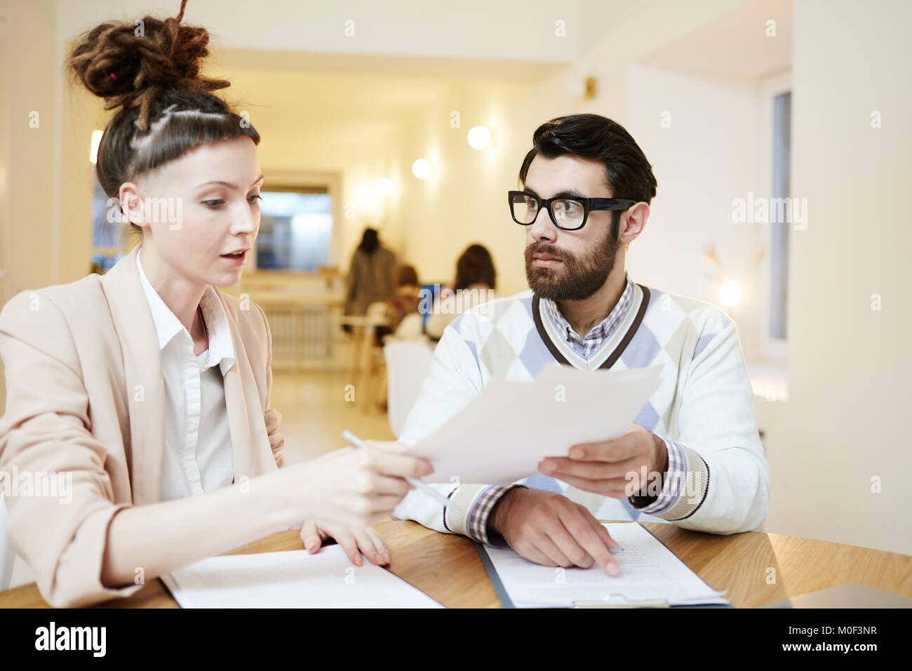 Passing over paper Stock Photo - Alamy